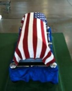 Draping a Casket with the U.S. Flag